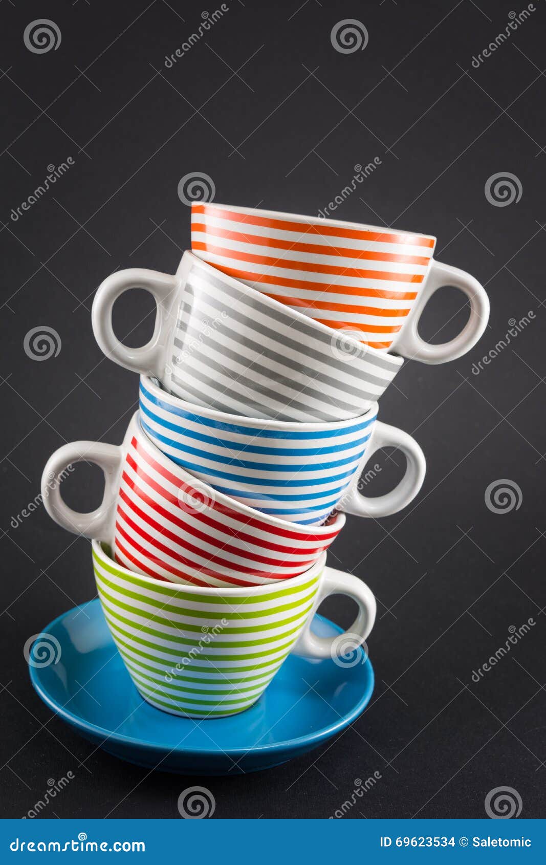 Four Tea Cups Stacked on Black Stock Photo - Image of background, mugs ...
