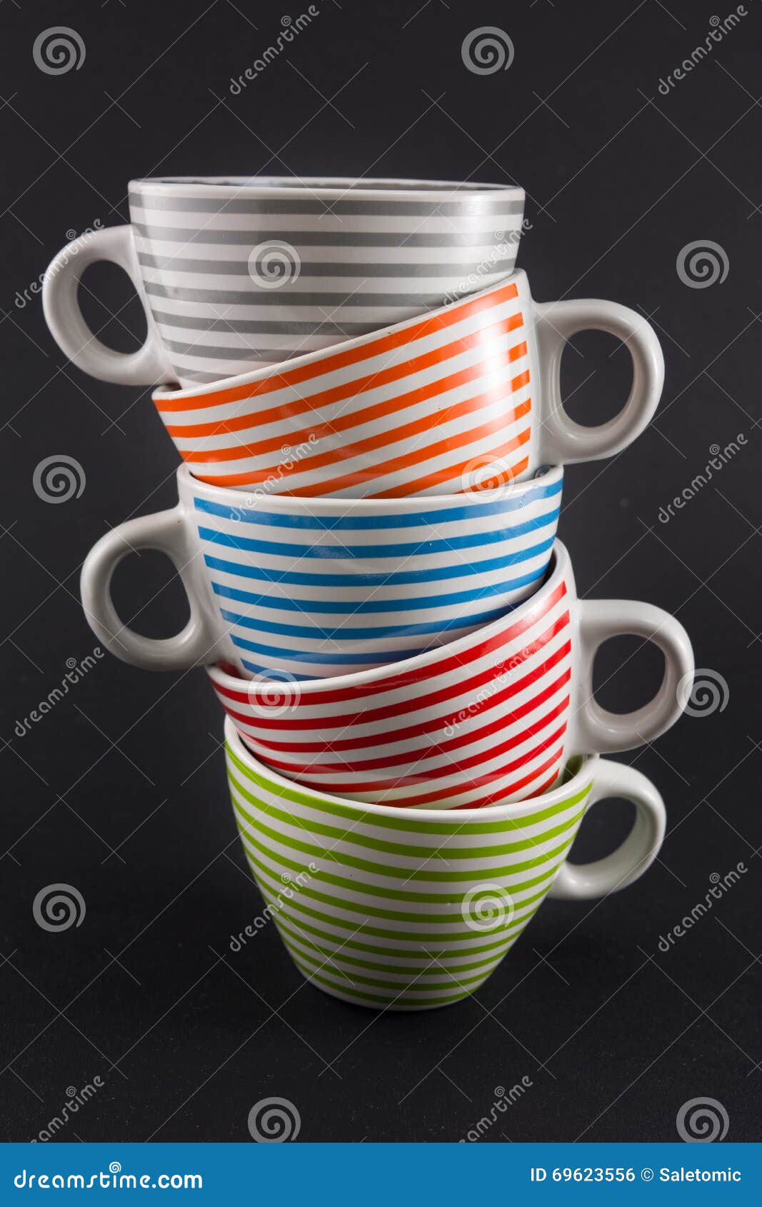 Four Tea Cups Stacked on Black Stock Photo - Image of four, green: 69623556