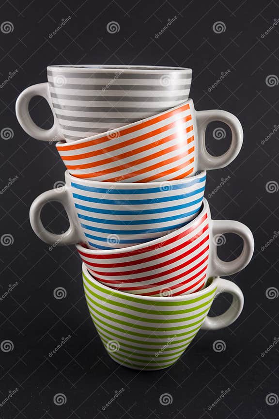 Four Tea Cups Stacked on Black Stock Photo - Image of four, green: 69623556