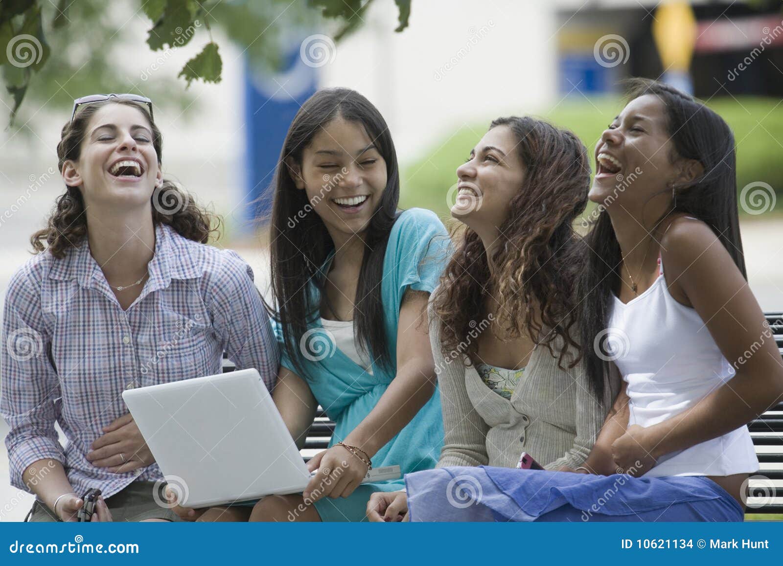 Four Teenage Girls Sitting and Smiling Stock Photo - Image of computer ... Four Teenage Girls Sitting and Smiling Stock Photo - Image of computer ...