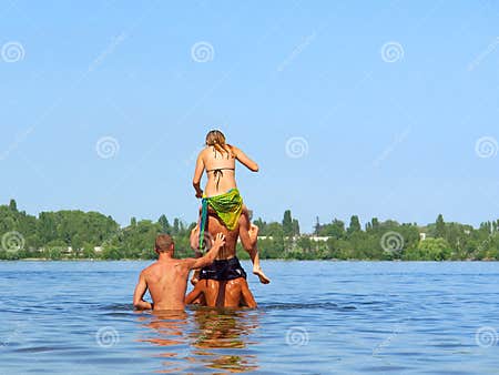 Four Teens - Triple Piggyback Stock Photo - Image of outdoors, beauty ...