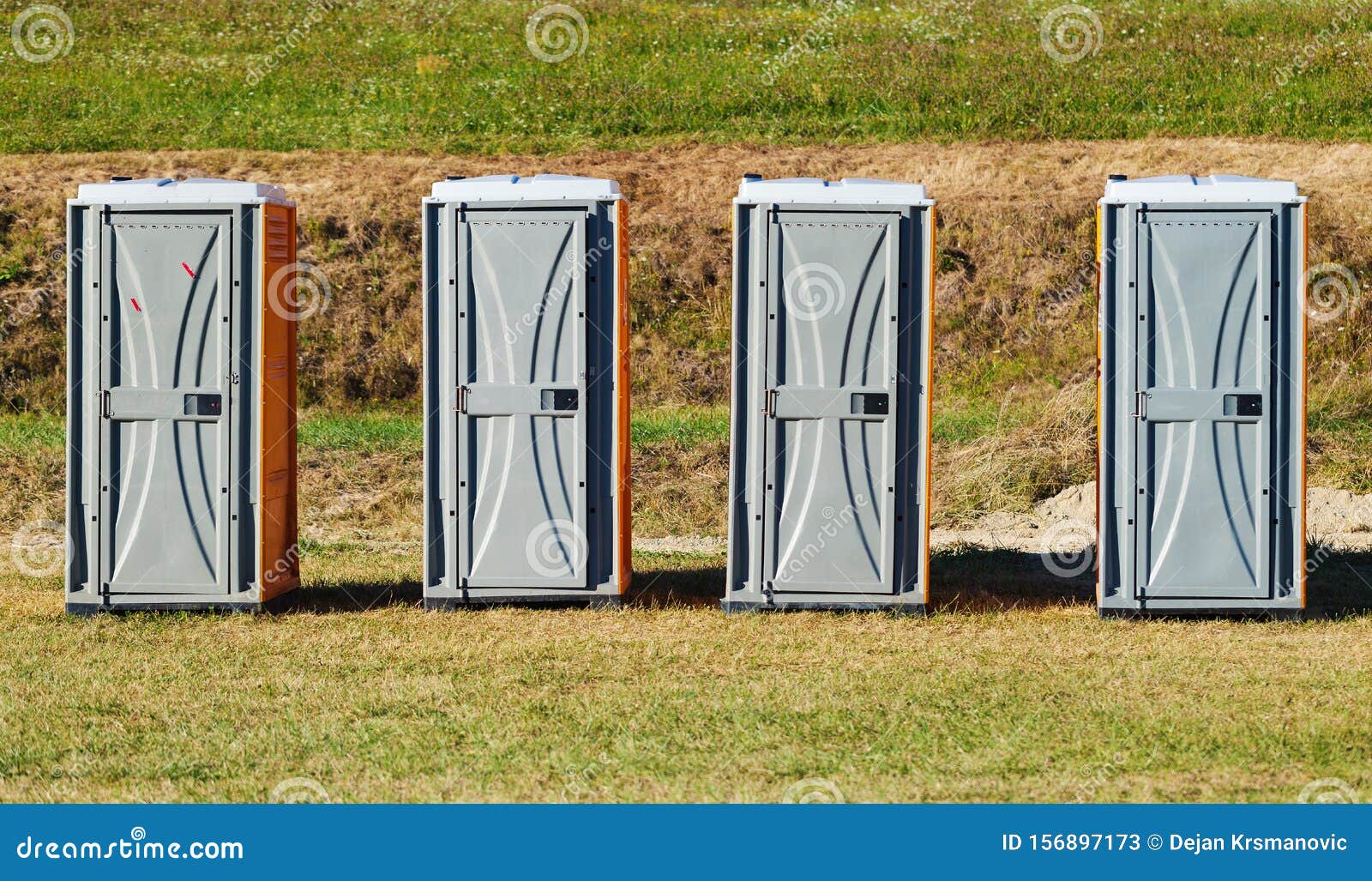 Four Toilets on Field stock image. Image of gray, container - 156897173