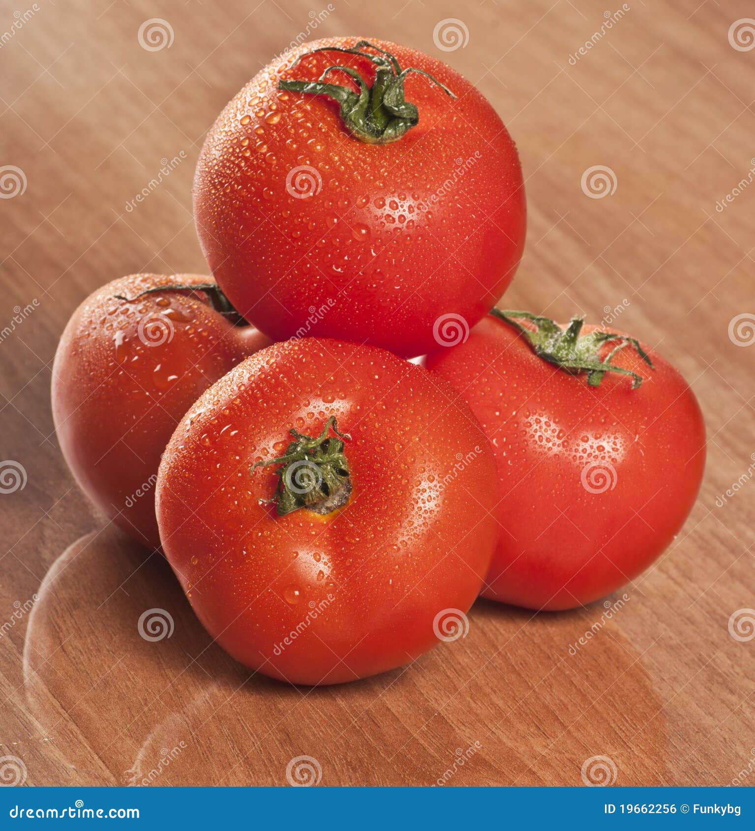 Four tomatoes stock photo. Image of ingredients, green - 19662256