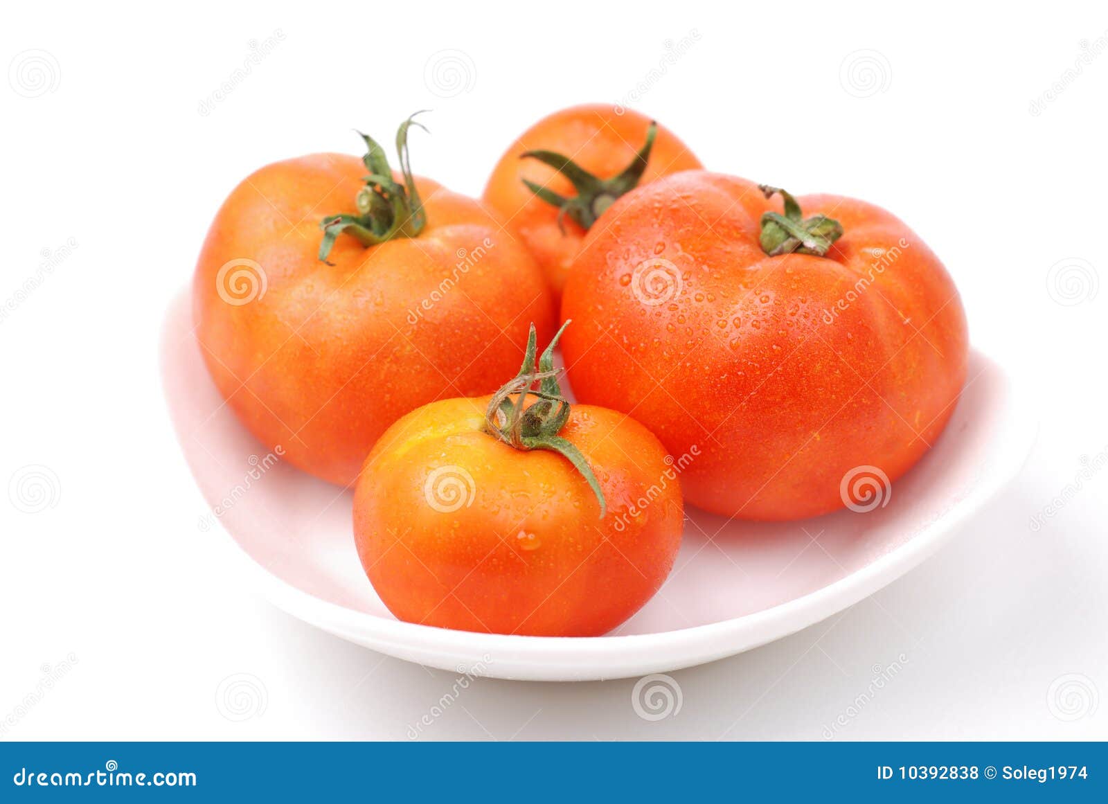 Four tomatoes on a plate stock photo. Image of nature - 10392838