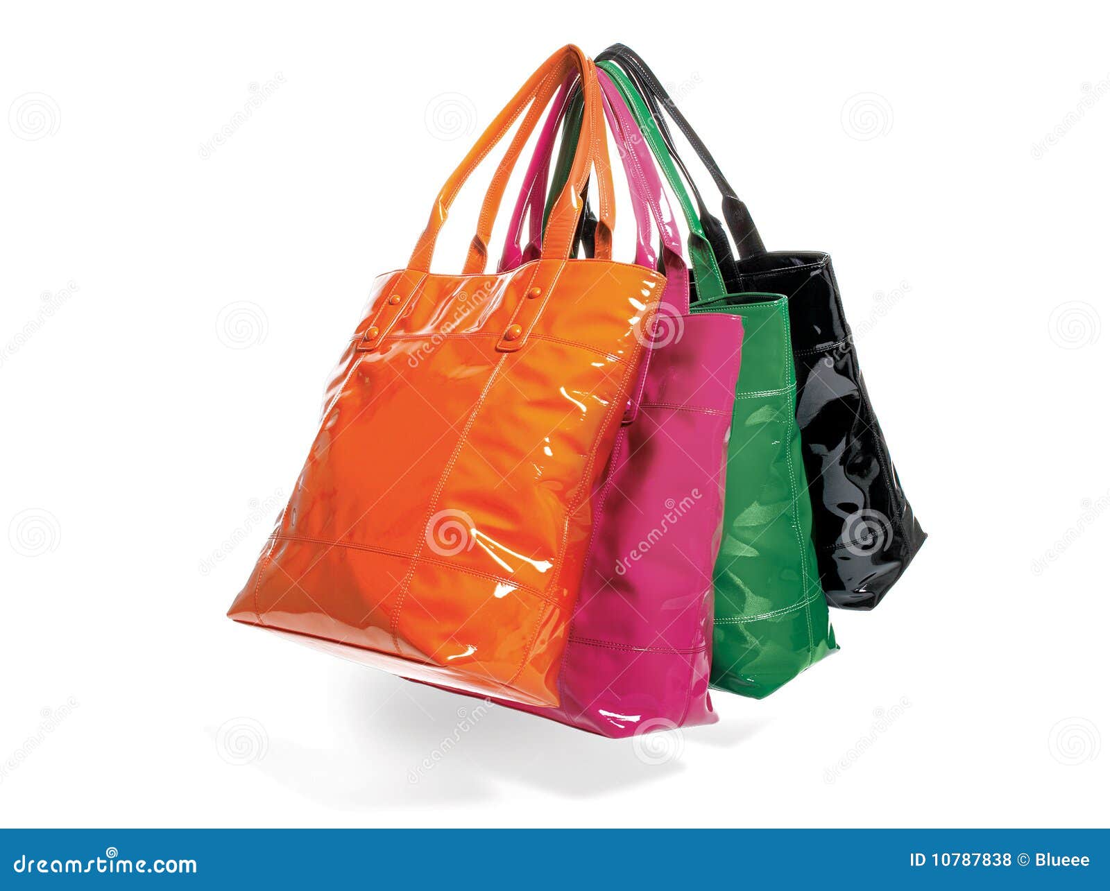 Four Tote Bags in Assorted Colors Stock Photo - Image of customer, pink ...