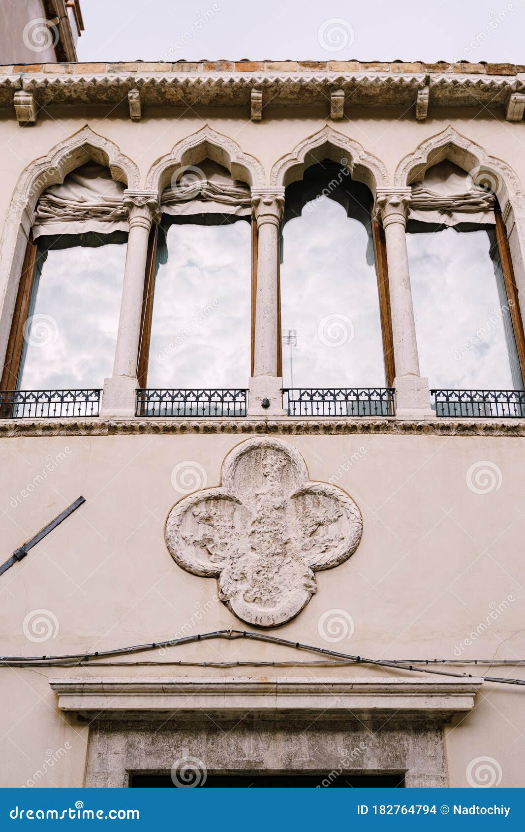 Close-ups of Building Facades in Venice, Italy. Four Venetian Windows ...