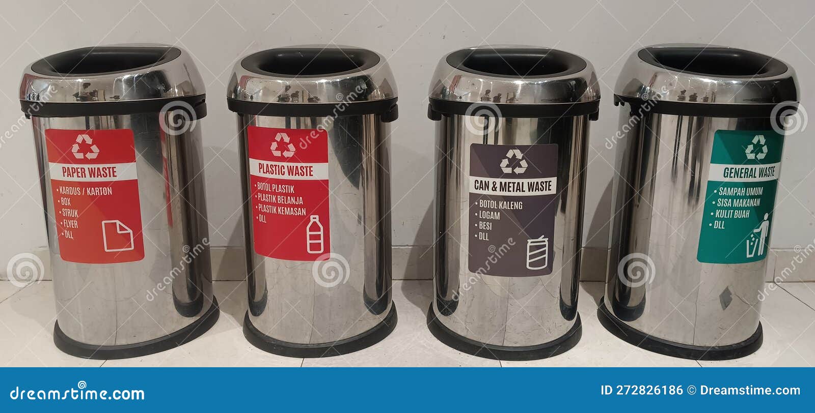 Four Waste Type Metal Dustbins in Row Stock Photo - Image of metal ...