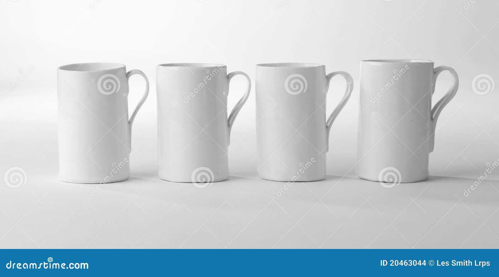 Four White Porcelain Mugs stock photo. Image of glaze - 20463044