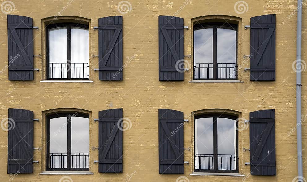 Four Windows on the Frontage of a House Stock Image - Image of house ...