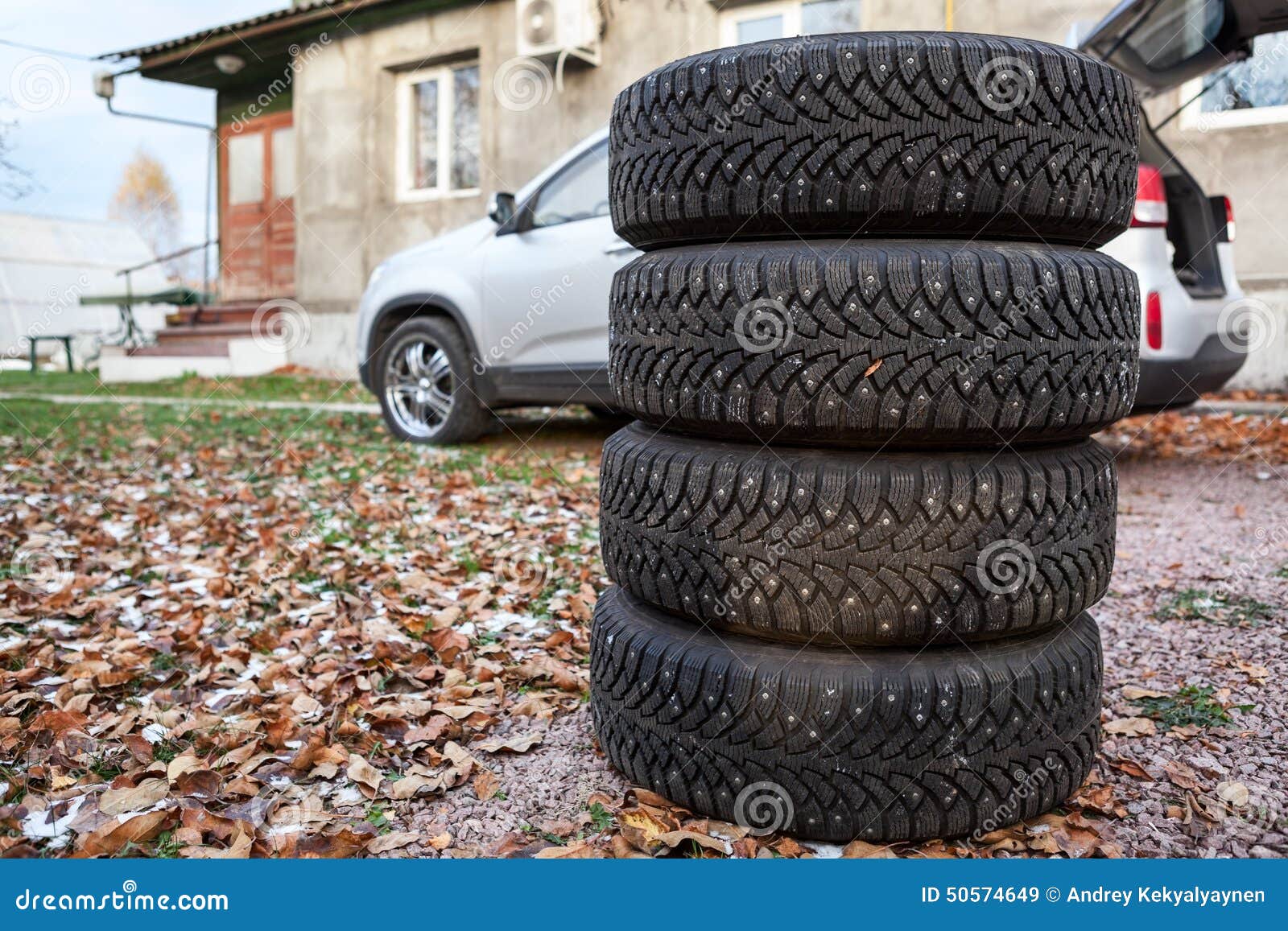 Four Winter Tire Wheels Ready for Changing Near Car, Copyspace Stock ...