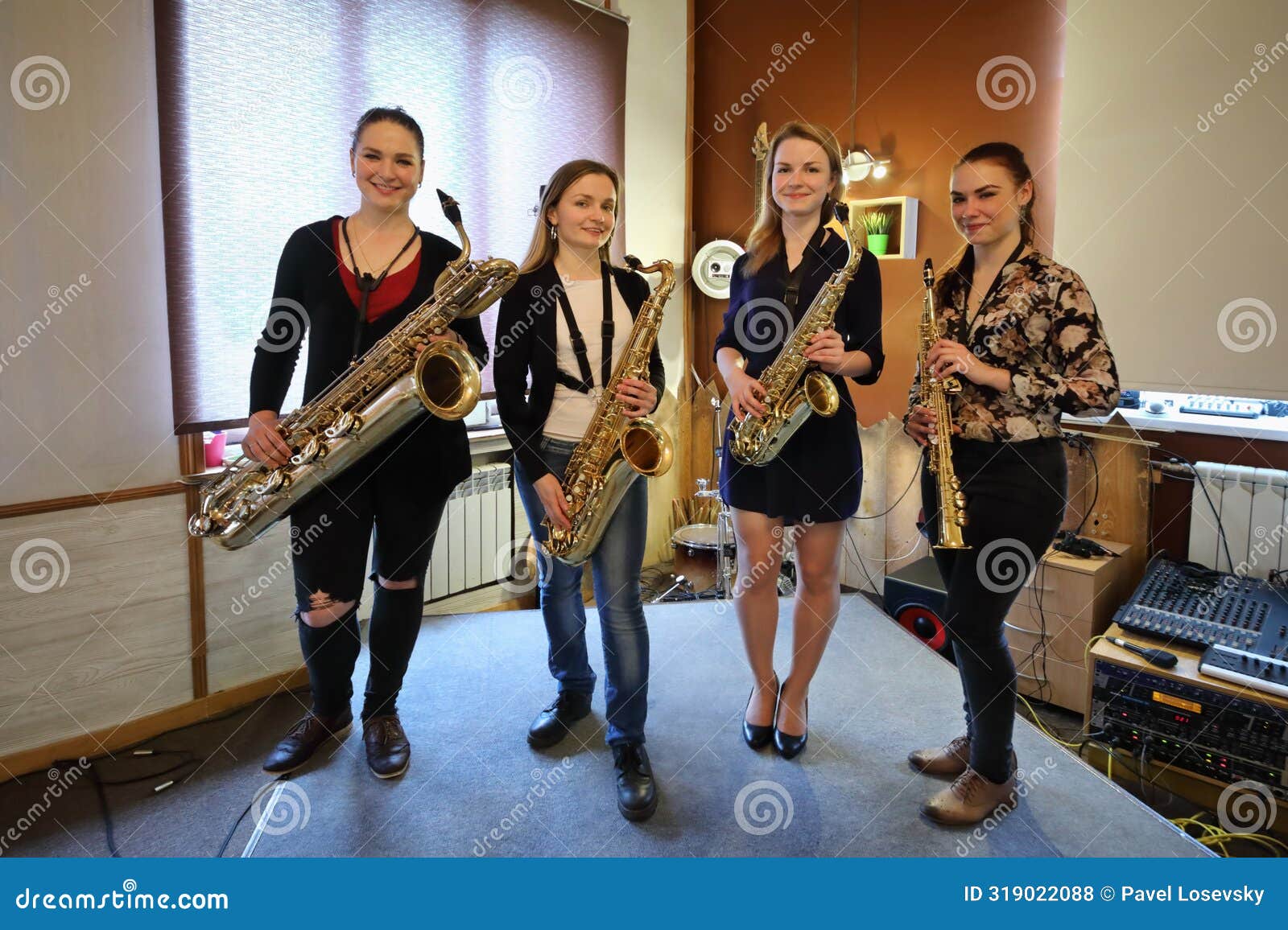 Four Women Poses with Wind Instruments in Sound Stock Photo - Image of ...