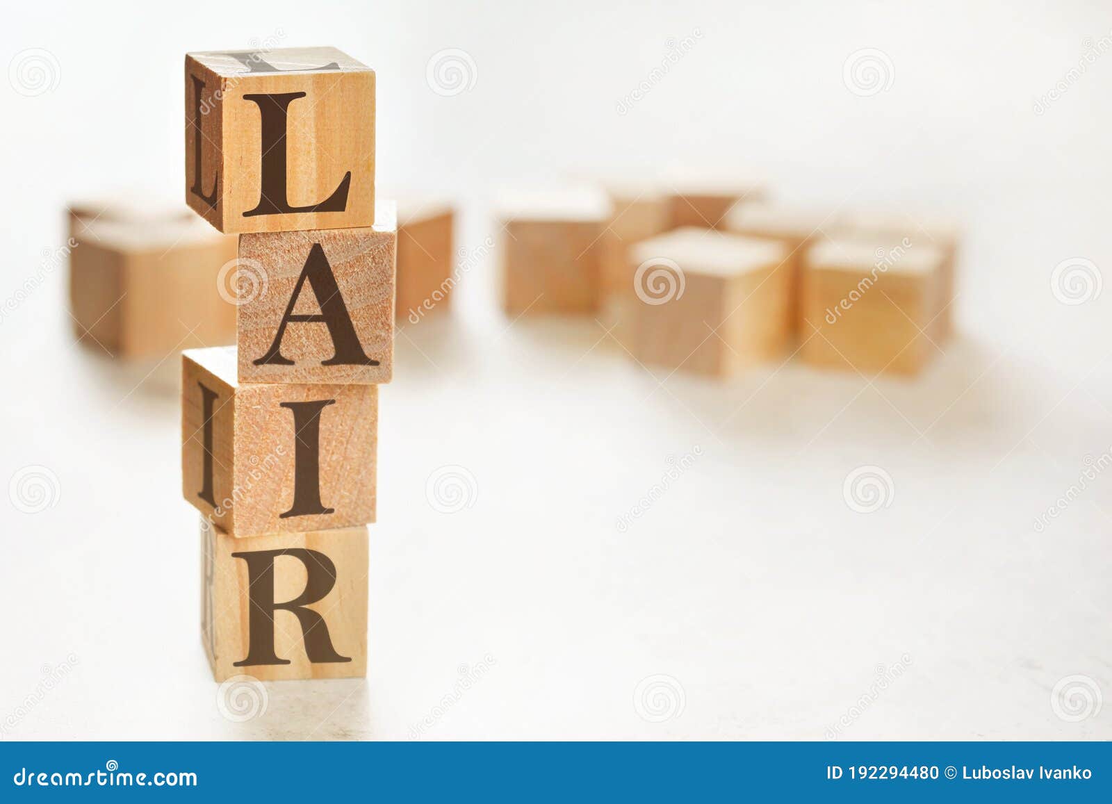 Four Wooden Cubes Arranged in Stack with Text LAIR Meaning Listen ...