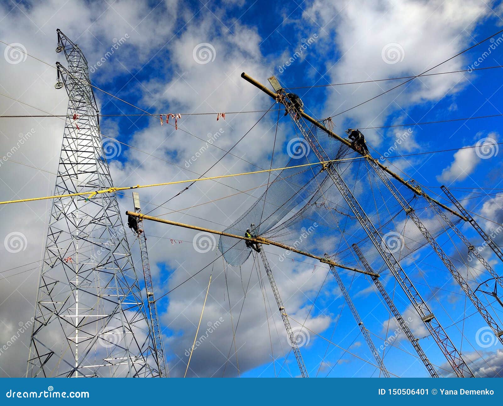 Four Workers Install a New High-voltage Power Line. Stock Image - Image ...