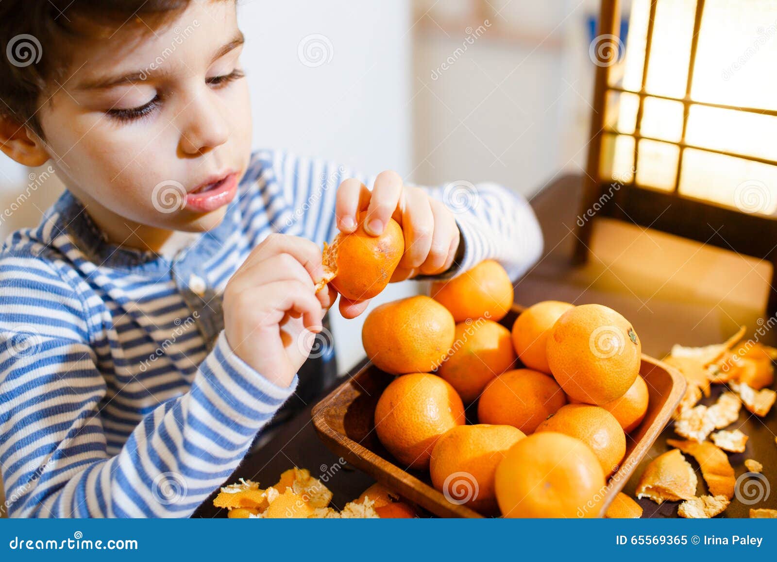 Four Years Boy Eat a Mandarin Stock Image - Image of hand, food: 65569365