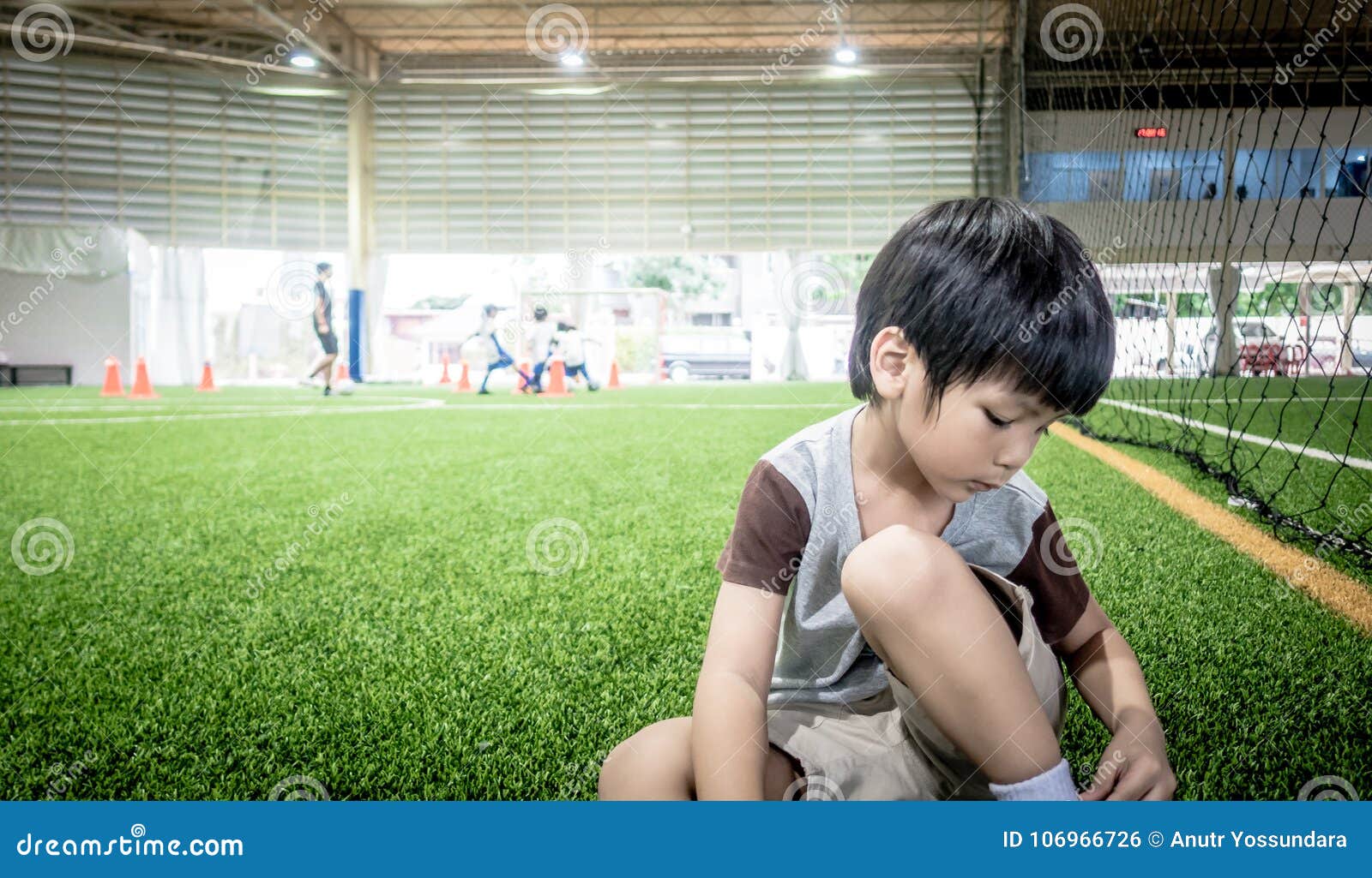 Four Years Old Boy is Practicing on Soccer Training Field with Copy ...