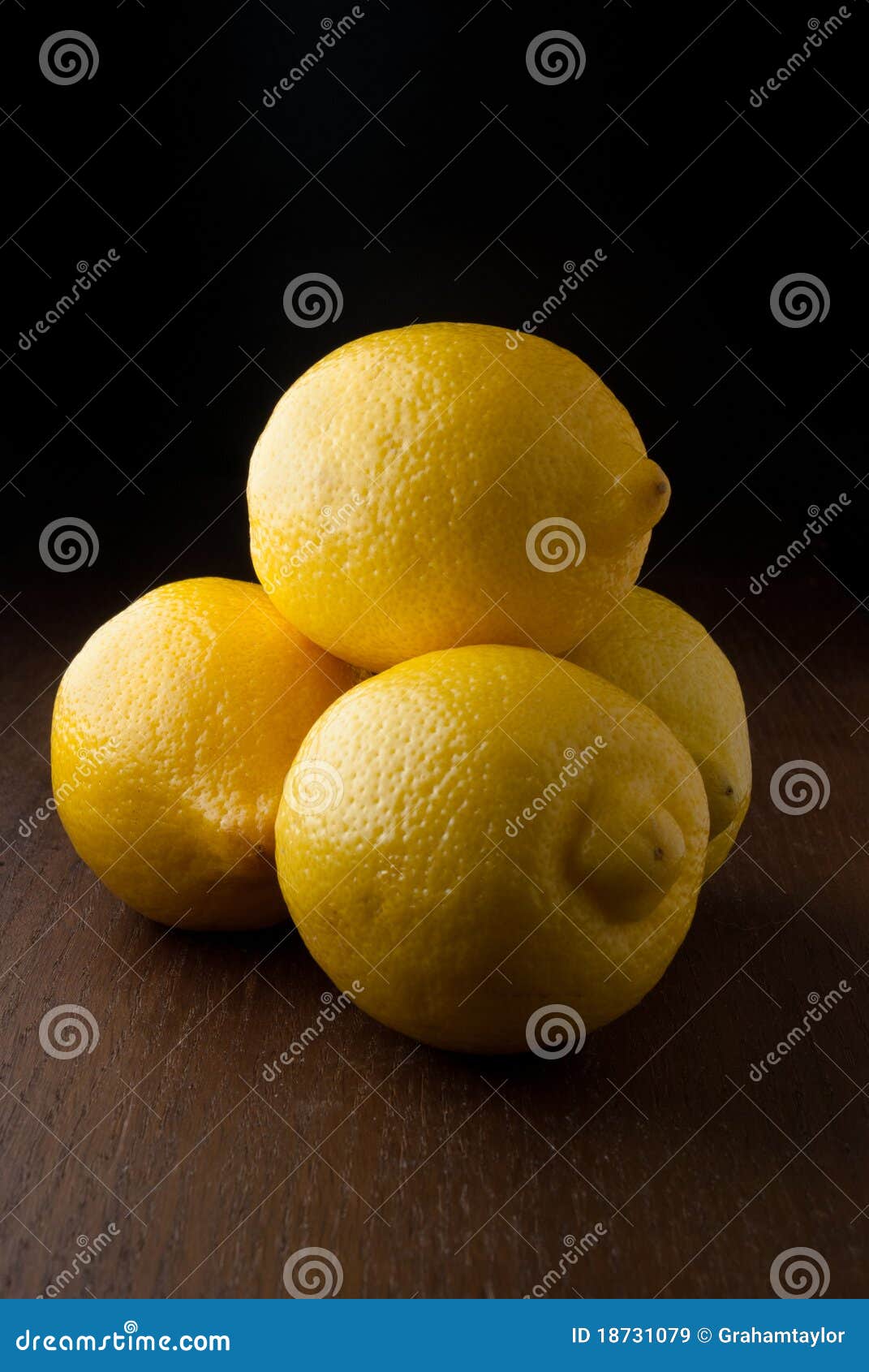 Four Yellow Fresh Lemons on a Wood Table Stock Image - Image of natural ...