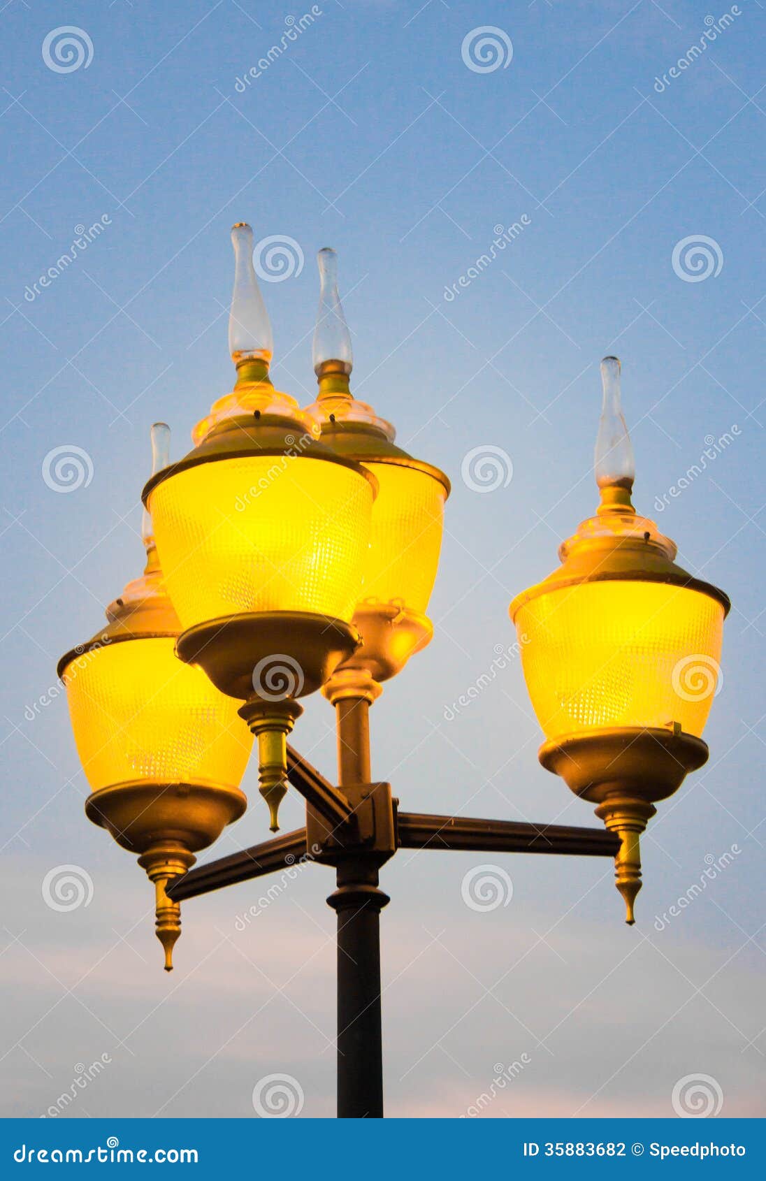 Four yellow lamp stock photo. Image of evening, pole - 35883682