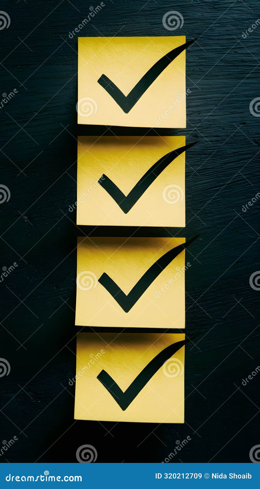 Four Yellow Post it Notes with Black Checkmarks, Showing Completed ...