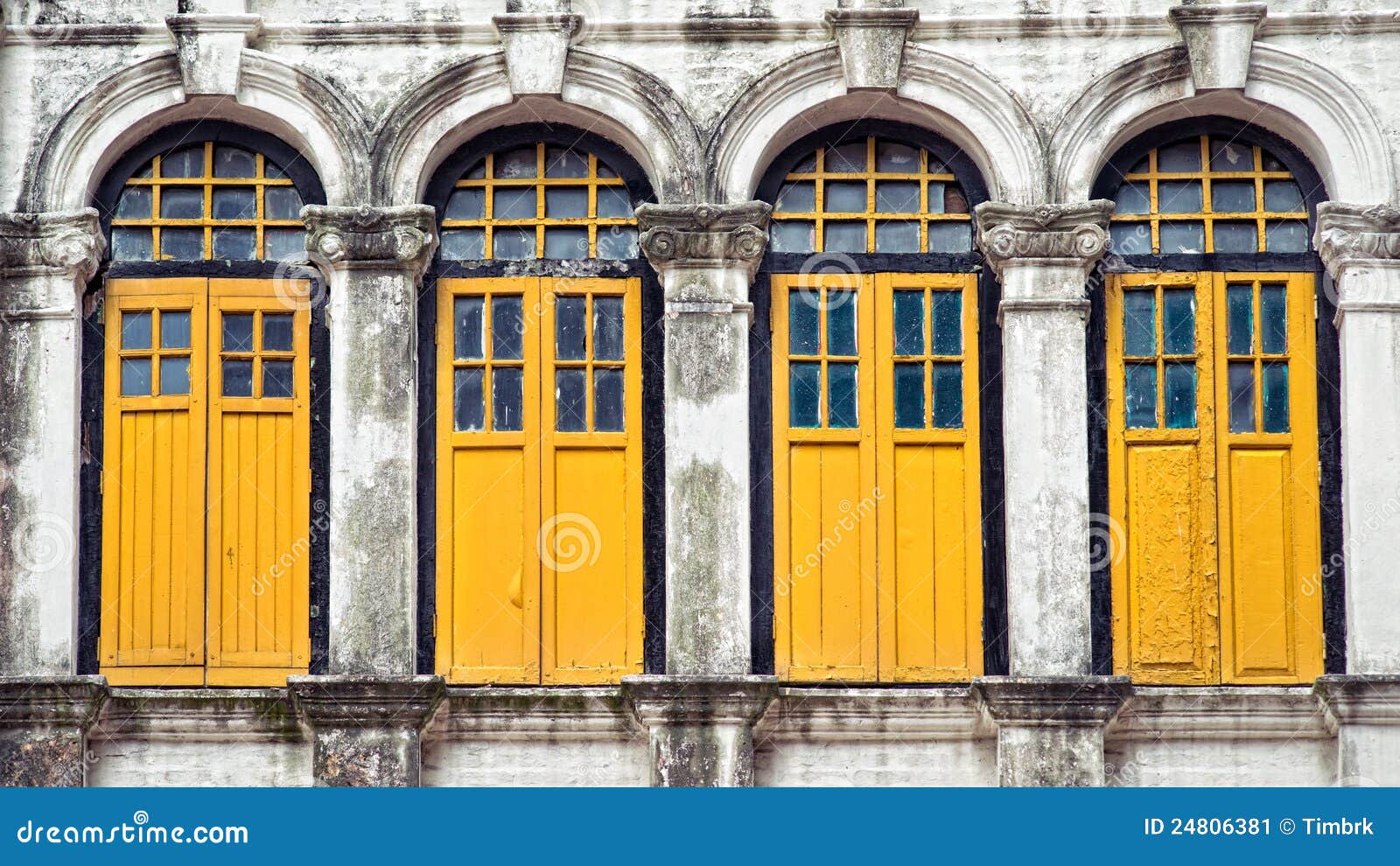 Four yellow windows stock image. Image of frontage, yellow - 24806381