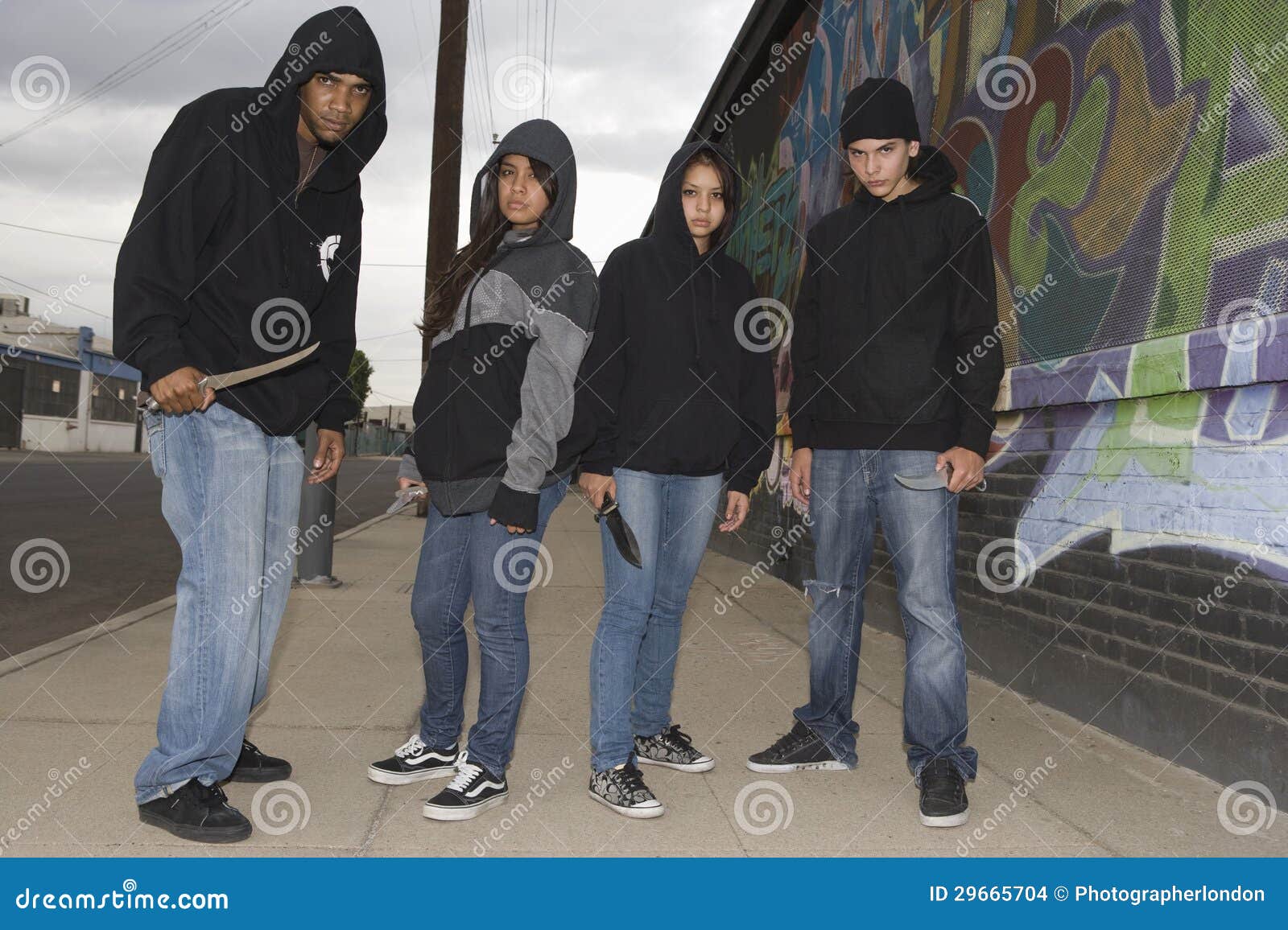 Four Young Angry Robbers with Knives Stock Photo - Image of graffiti ...