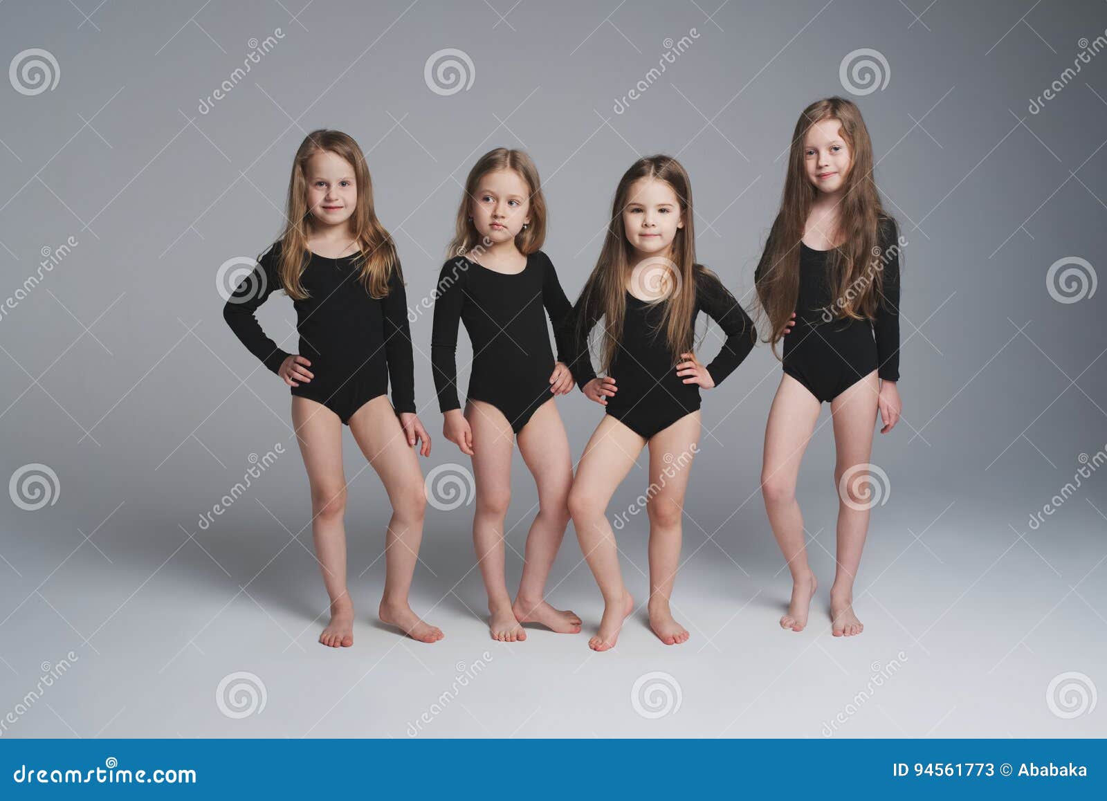 Four Young Beautiful Models on Grey Stock Image - Image of fashionable ...