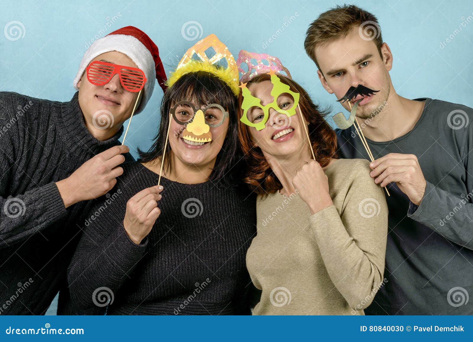 Four Young Men in Festive Masks Stock Photo - Image of christmas ...
