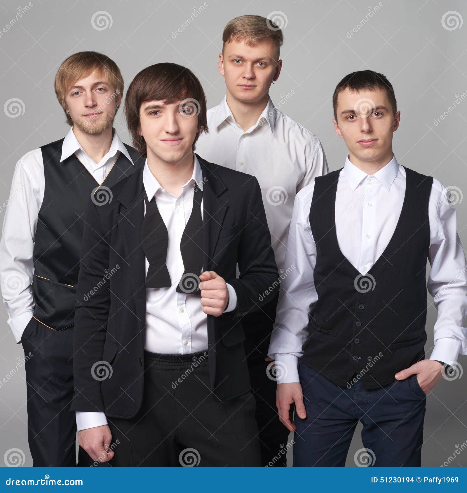 Four young men stock photo. Image of friendship, elegant - 51230194