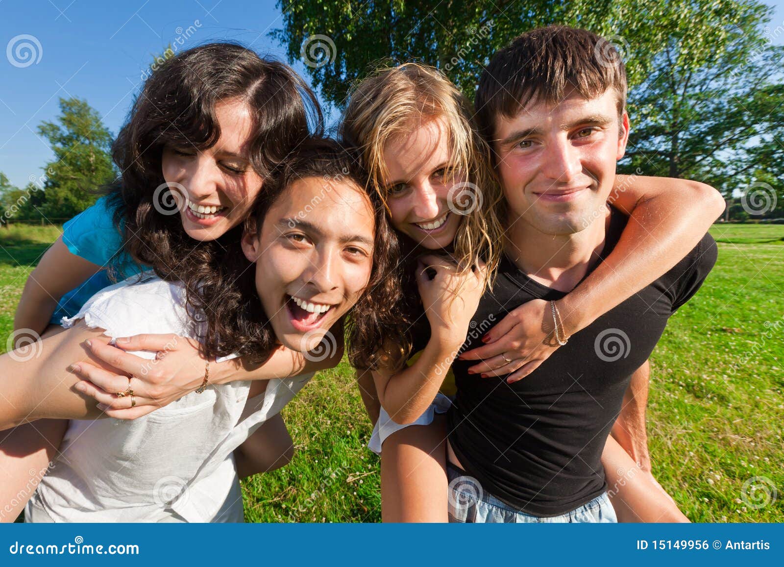 Four Young People Having Fun in the Park Stock Photo - Image of lady ...