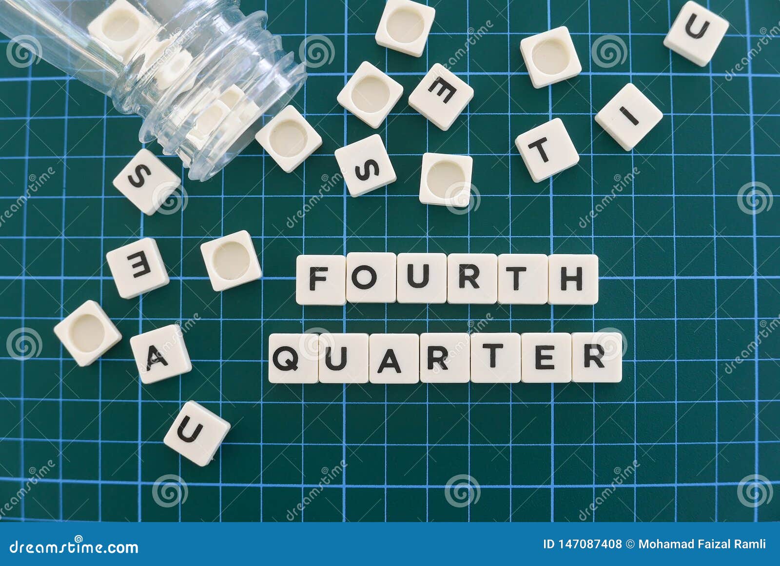 Fourth Quarter Word Made Of Square Letter Word On Green Square Mat ...