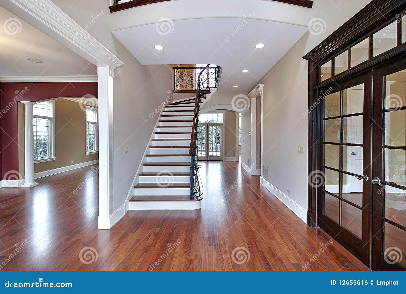 Foyer in New Construction Home Stock Photo - Image of elegant, entryway ...