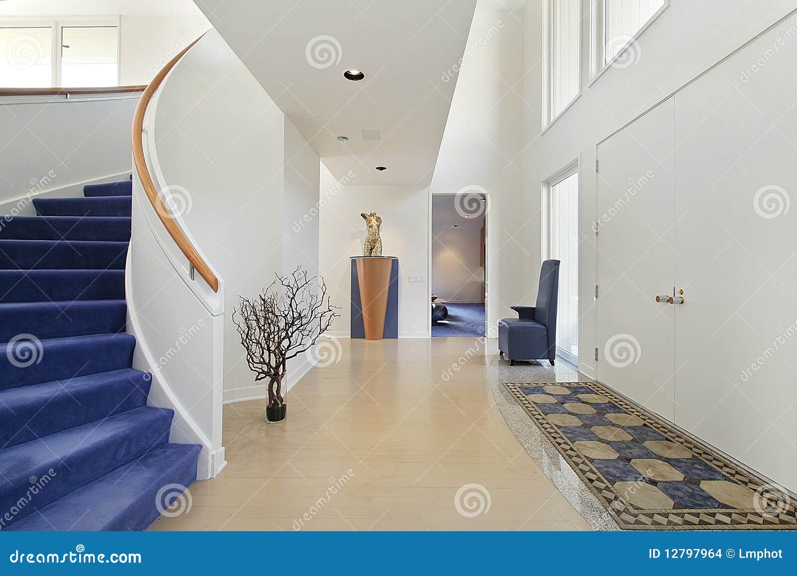 Foyer with Spiral Staircase Stock Photo - Image of living, decorate ...