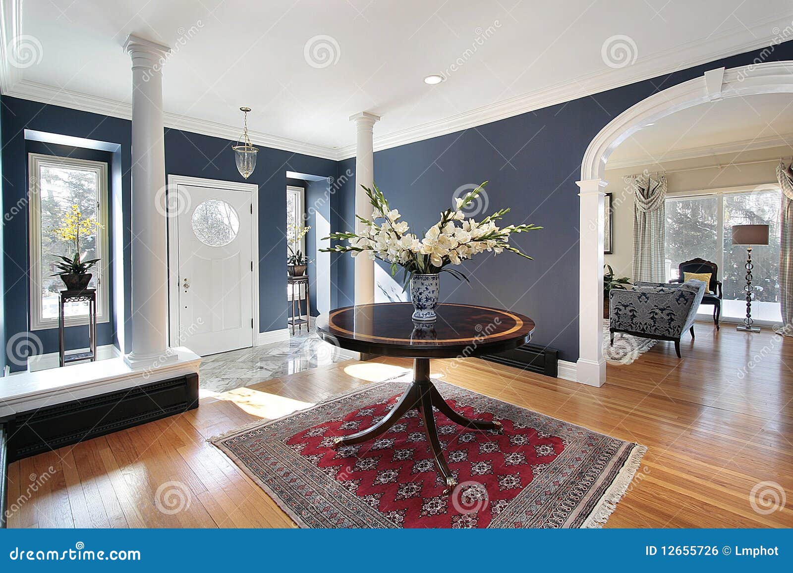 Foyer with white columns stock photo. Image of carpet - 12655726