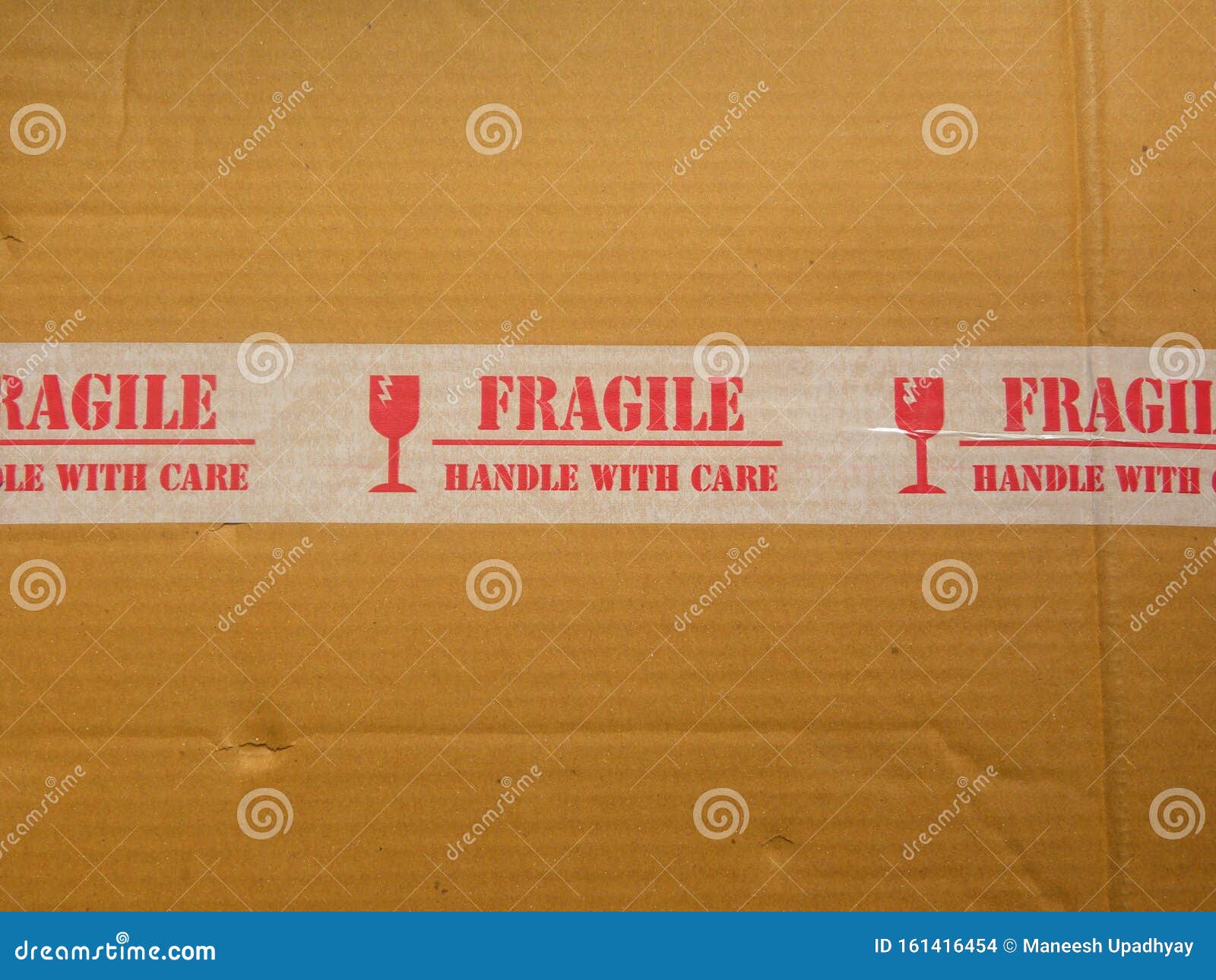 Fragile Handle With Care Cardboard Box In Male Hand Isolated Royalty ...