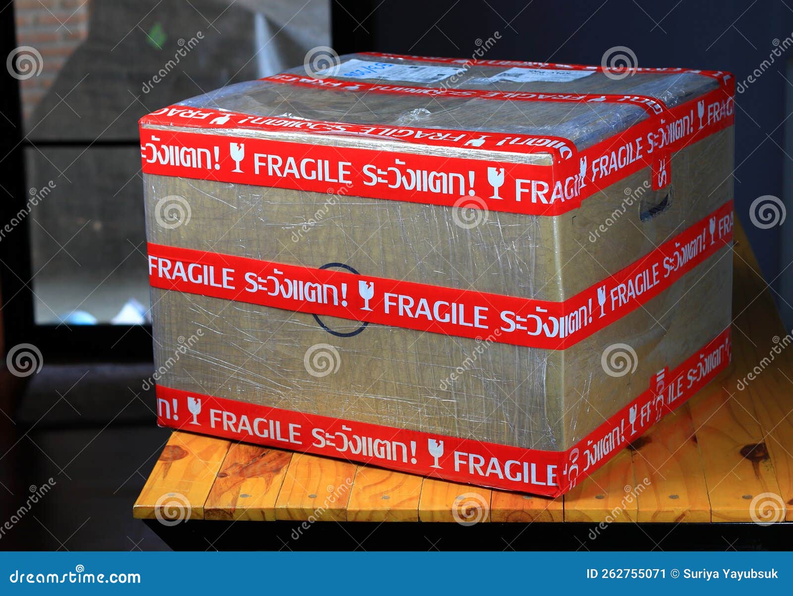 Fragile Marked Parcel, Cardboard Boxes with Fragile Symbol on Wooden ...