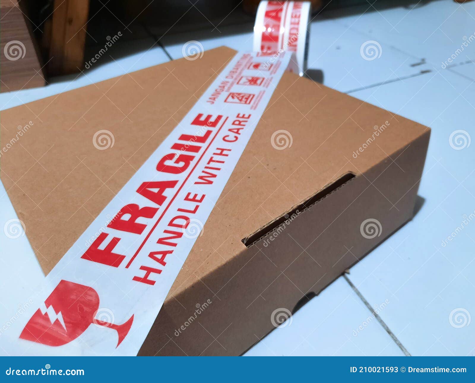 Fragile tape on the box stock image. Image of text, number - 210021593