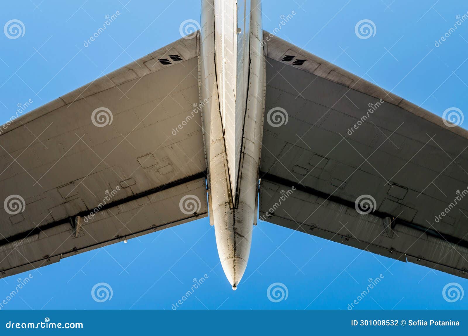 Fragment of Airplane Wings on a Background of Blue Sky Stock Photo ...