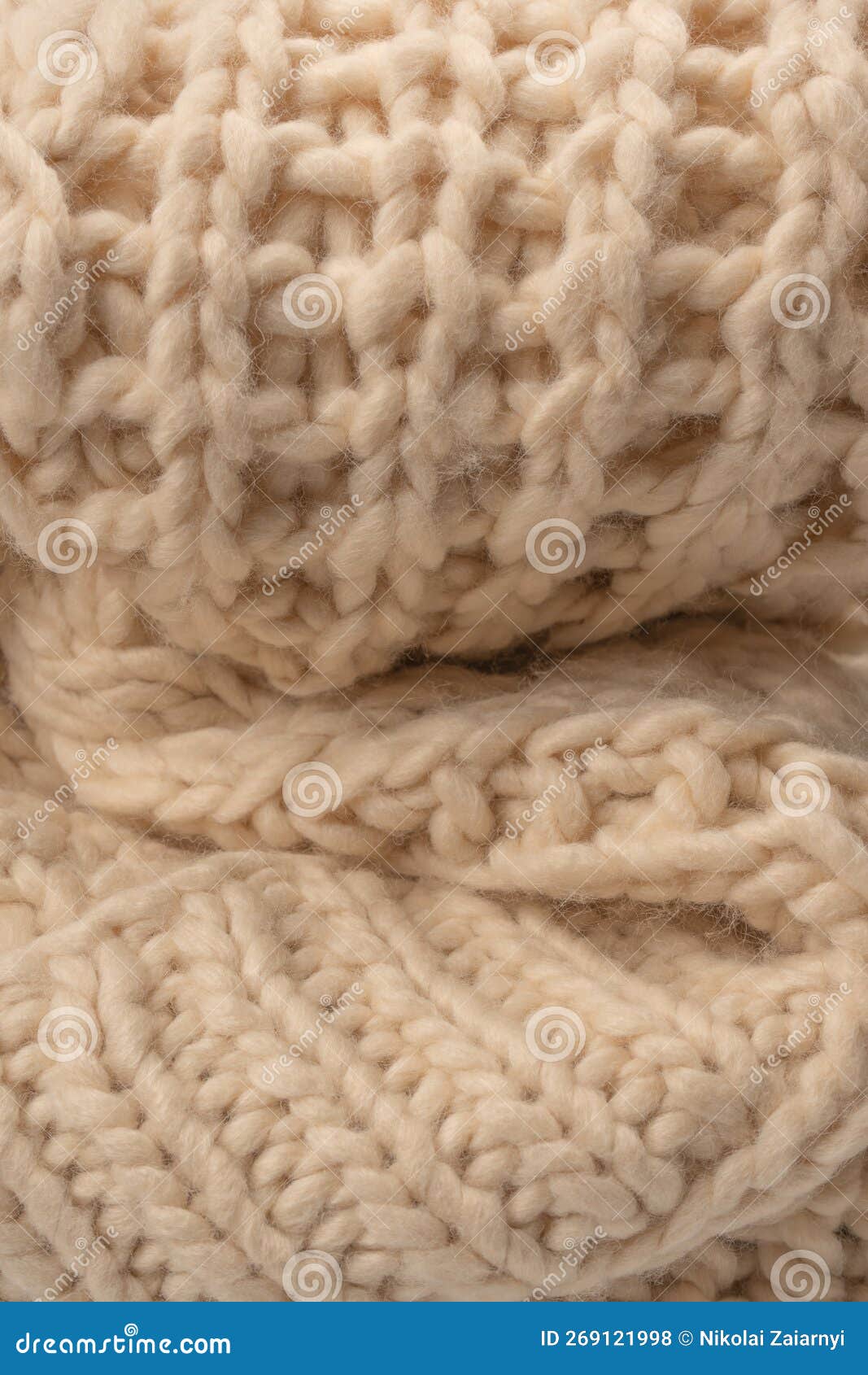 A Fragment of Beige Knitted Fabric, Knitted from White Sheep Wool Stock ...