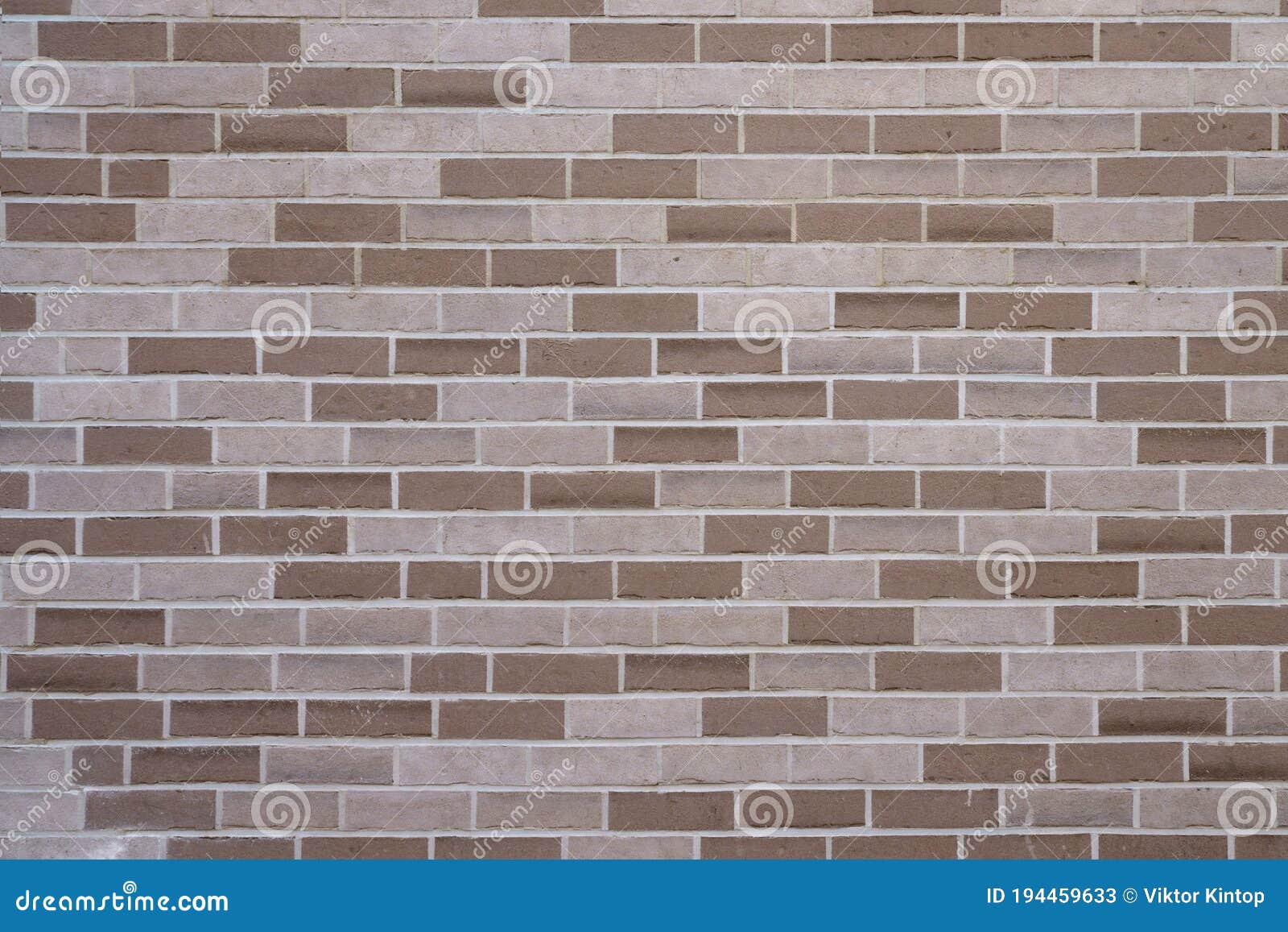 A Fragment of a Brick Wall Made of Dark and Light Brown Bricks Stock ...