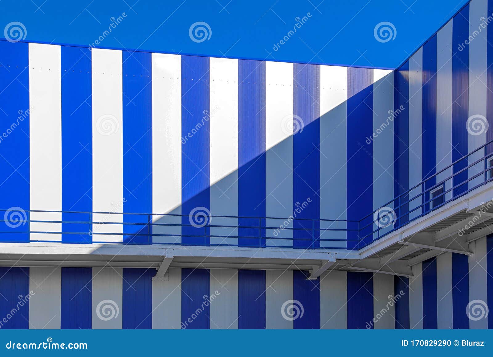 Fragment of a Building of Blue and White Stripes Stock Photo - Image of ...