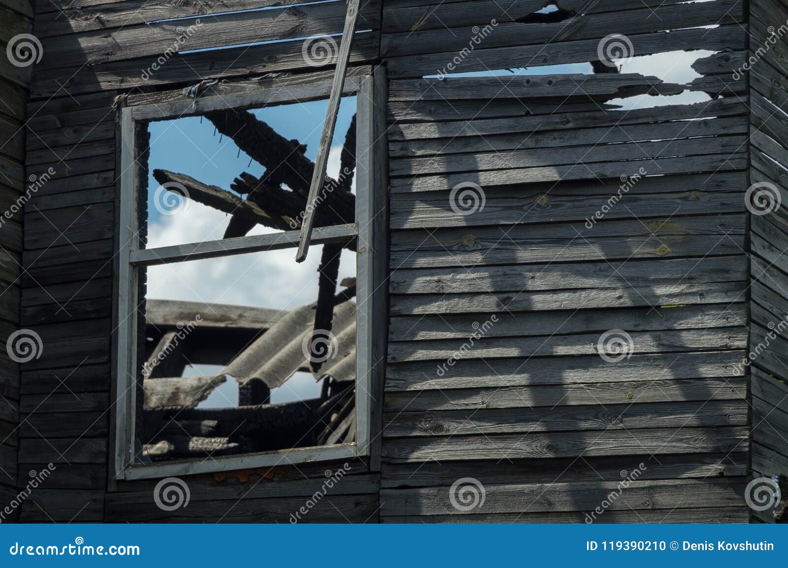 Fragment of the Destroyed Burned Wooden House Wall and Window. Remains ...