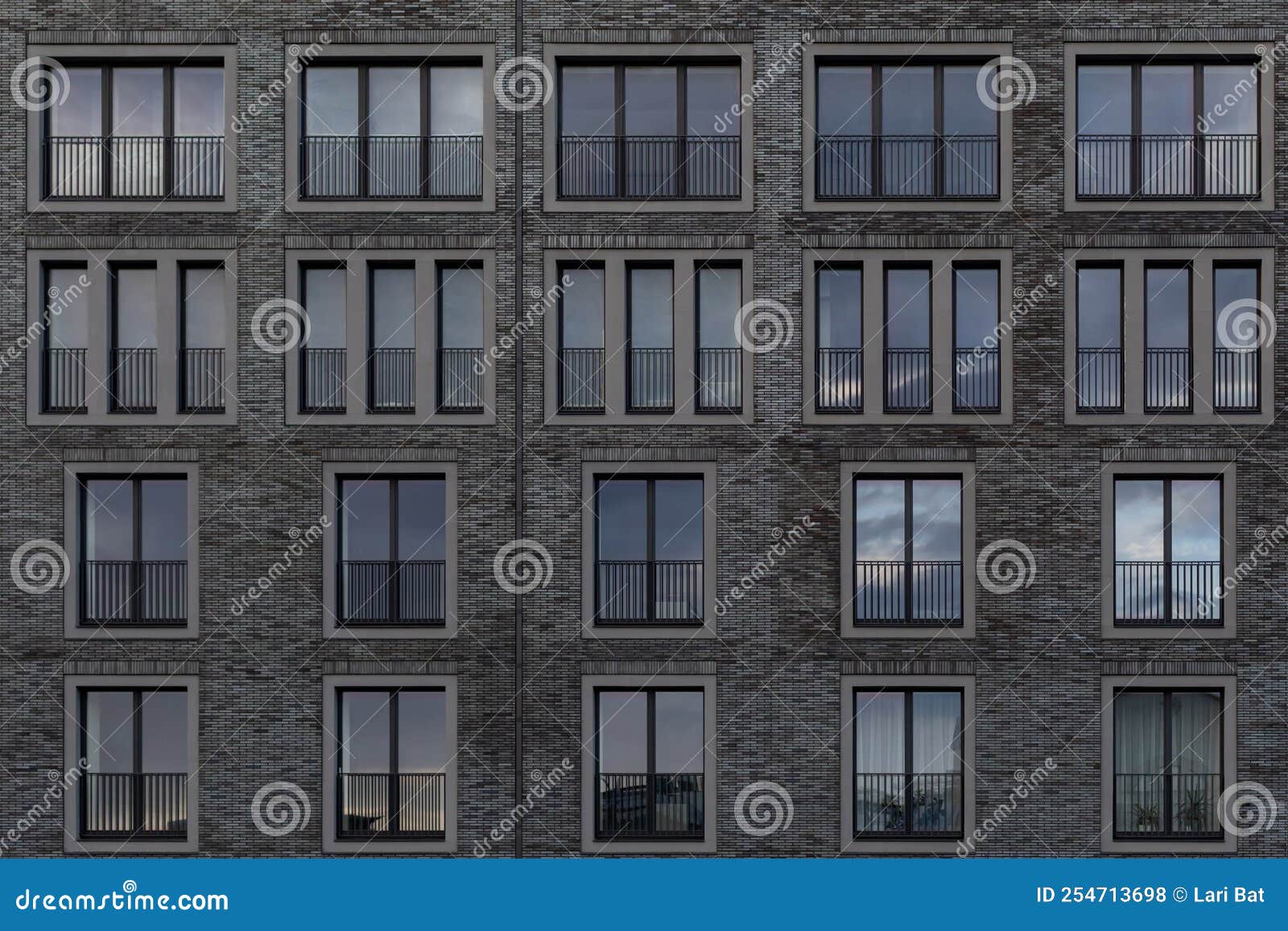 Fragment of Facade of Building with Windows. Facing with Black Brick ...