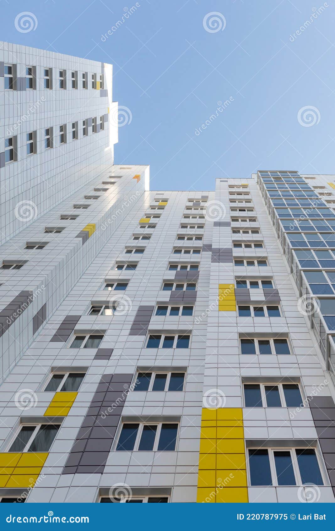Facade Of A New Multi-storey Building With White And Green Metal Siding ...