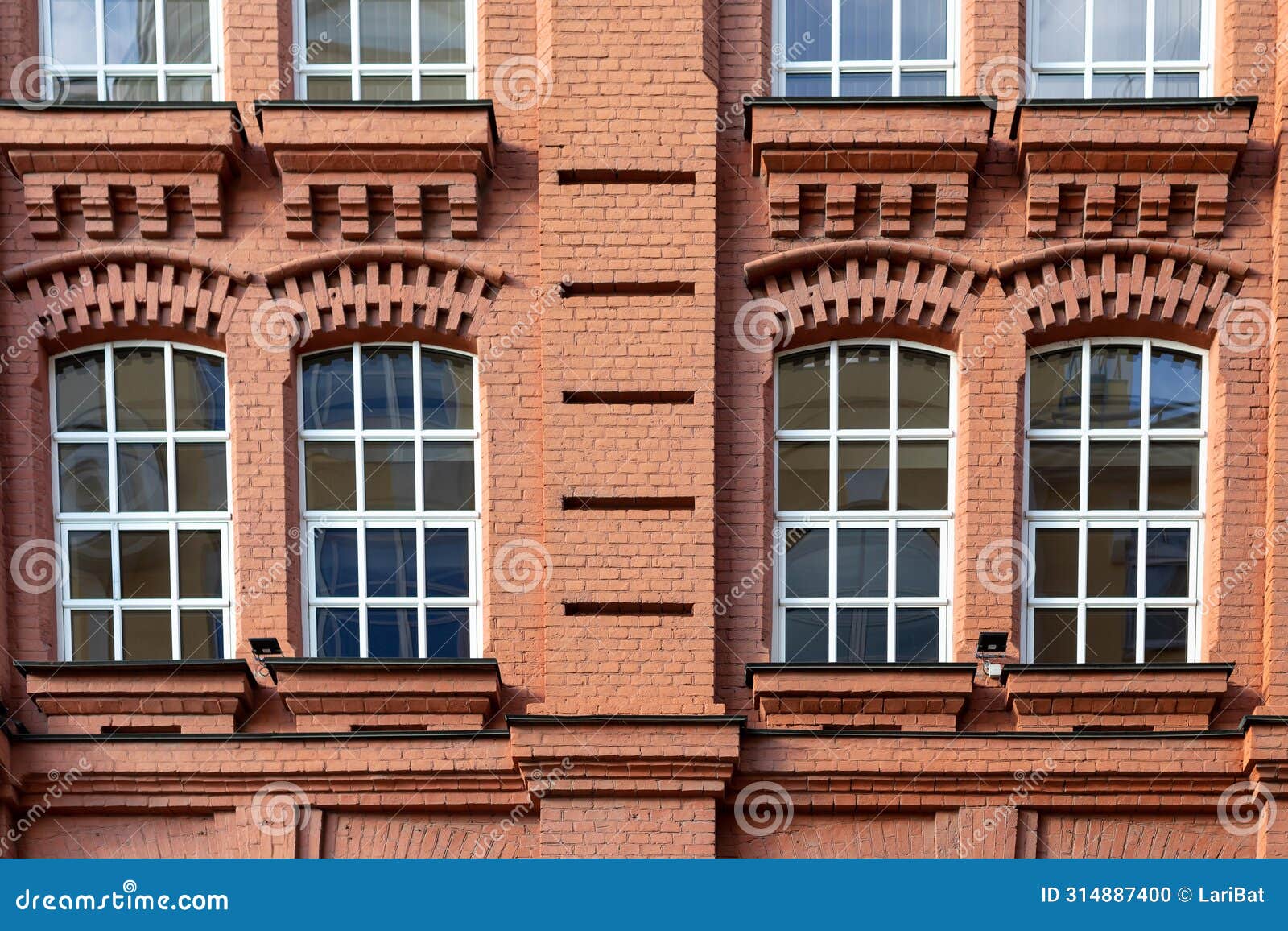 Fragment of Facade of Old Classic Red Brick Building with Four Large ...