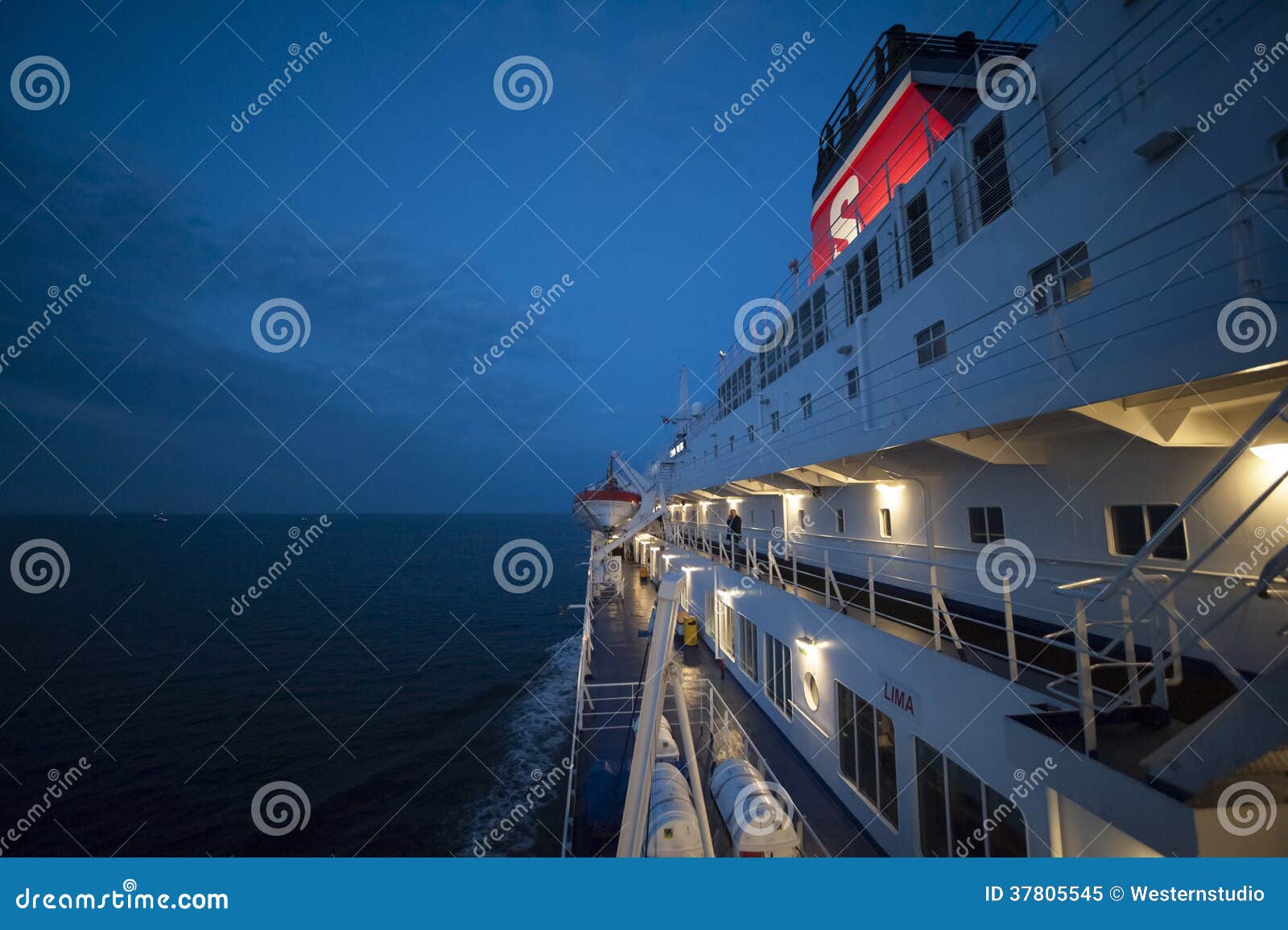 Fragment of a Ferry in the Sea at Night, with Illuminated Decks ...