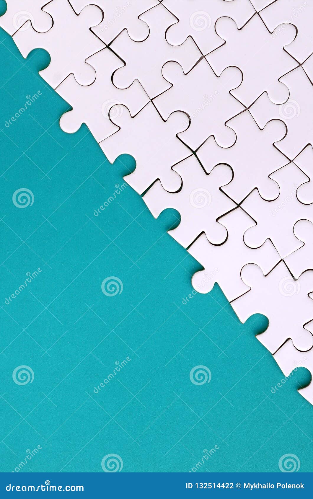 Fragment of a Folded White Jigsaw Puzzle on the Background of a Blue ...