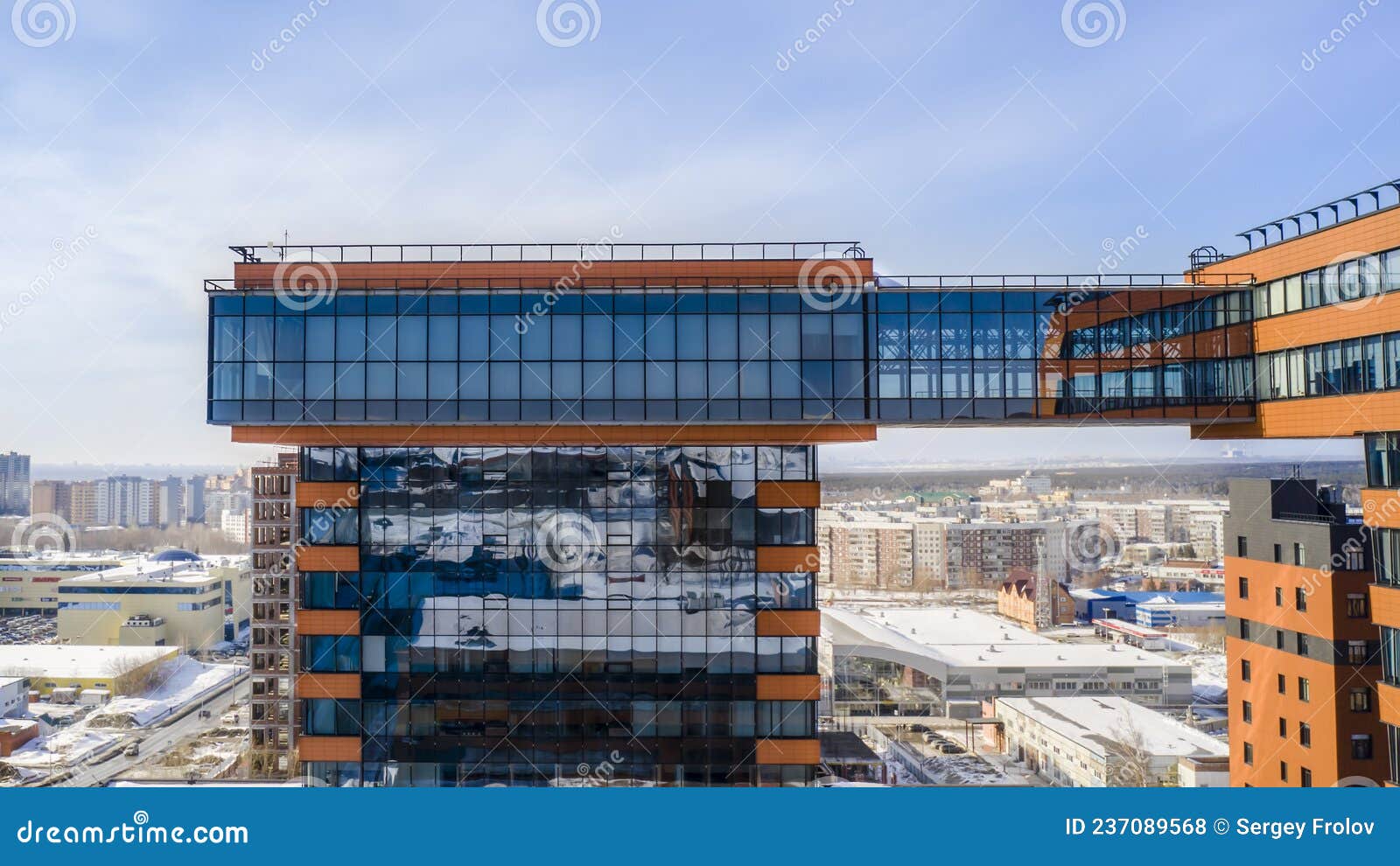 A Fragment of a Modern Building with Two Towers and a Glass Passage ...