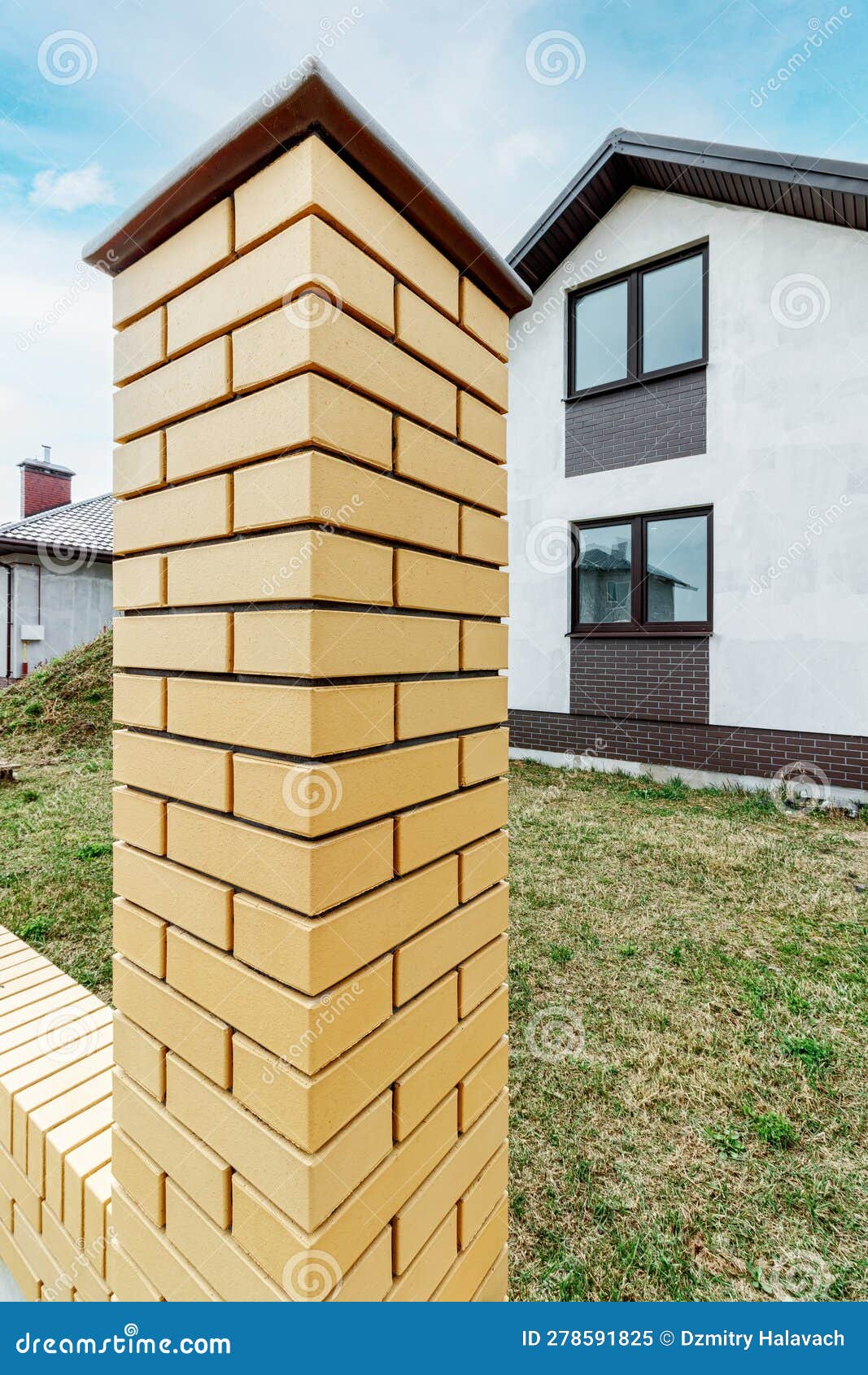 Fragment of a Modern Fence Lined with Decorative Bricks in the Old ...