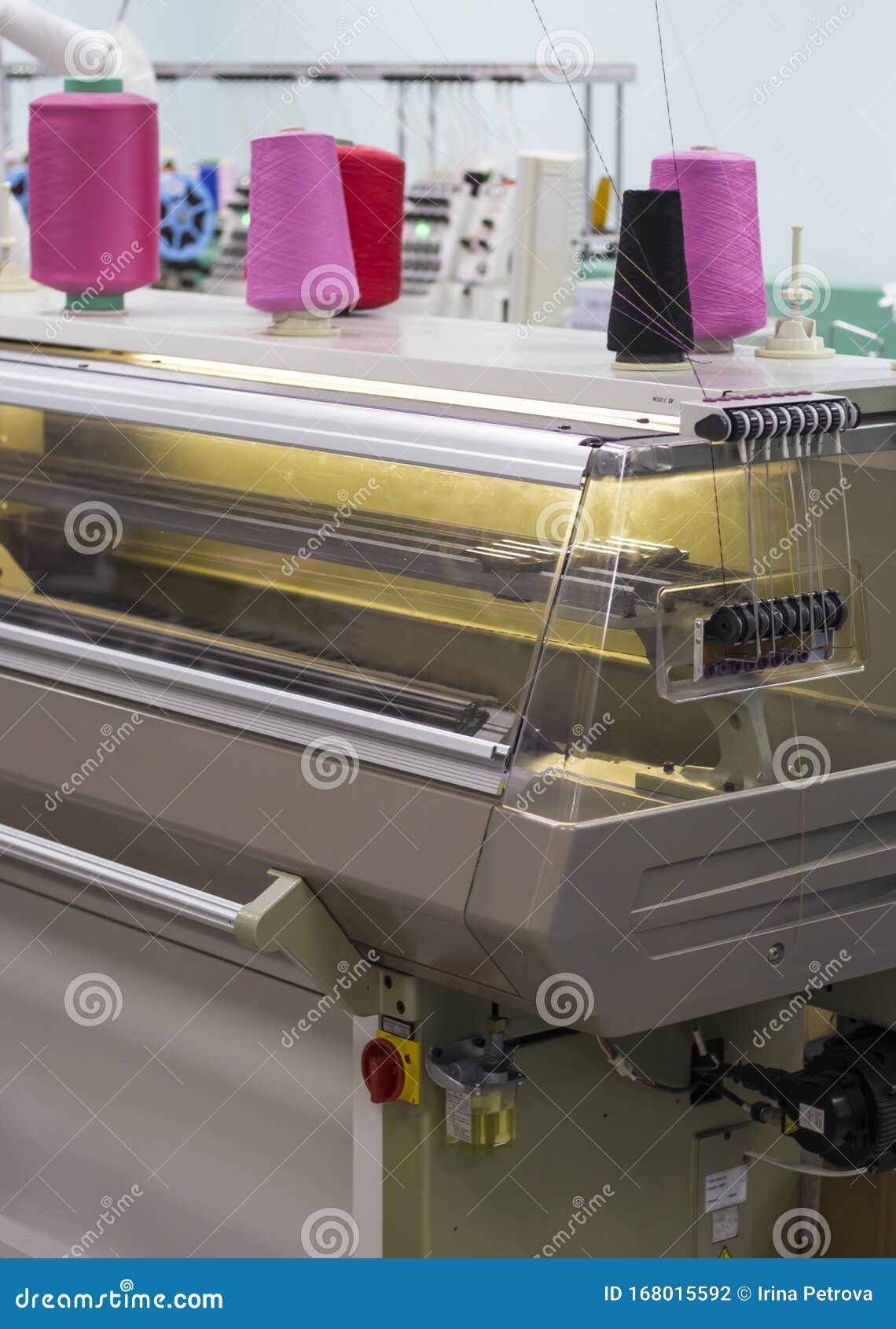 A Fragment of a Modern Knitting Machine in the Process of Knitting ...
