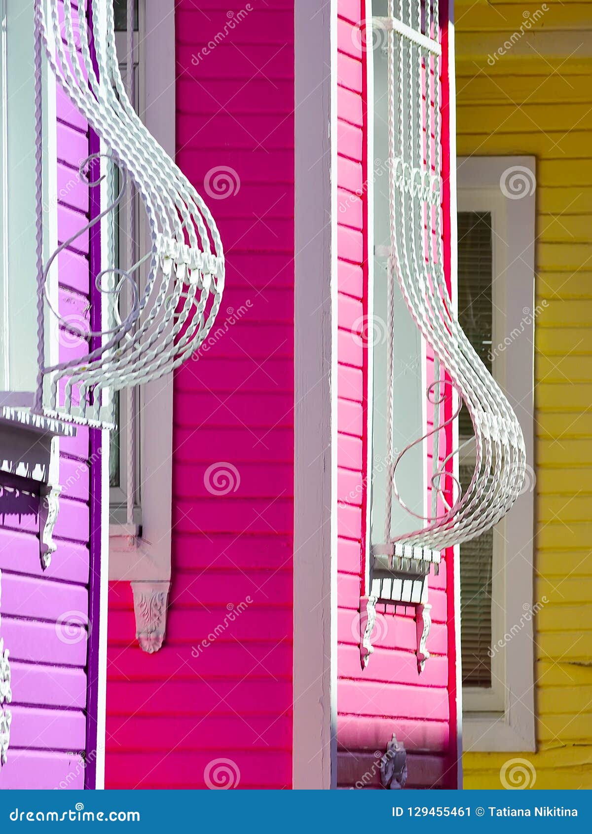 Fragment of a Multicolor Facade of the House with Curved Bars on the ...