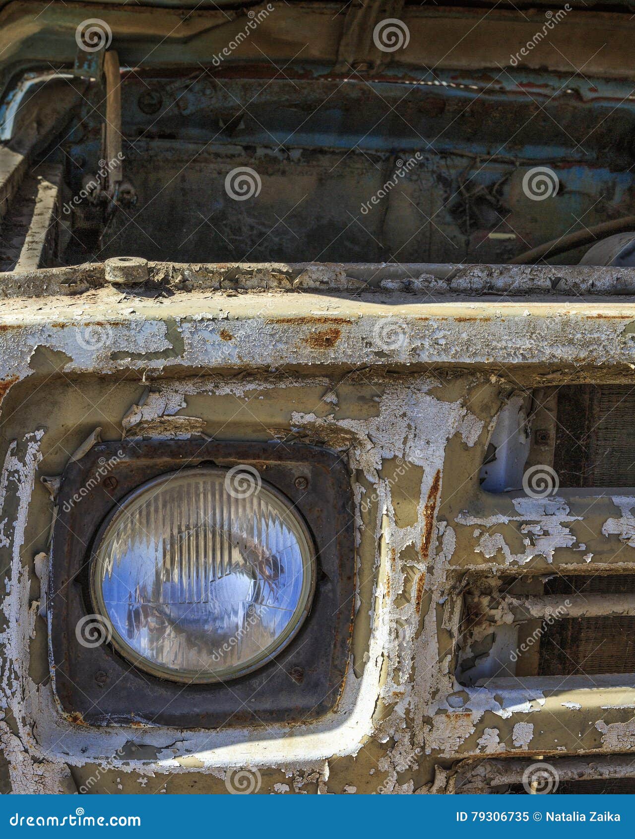 A Fragment of an Old, Rusty Car. Headlight and a Part of the Stock ...